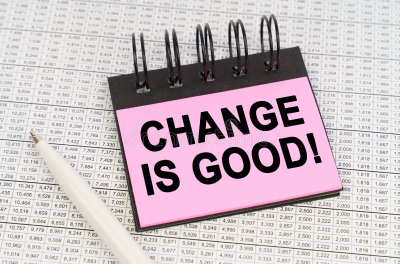 On Reporting Documents and Charts There is a Pen and a Notepad with the ...