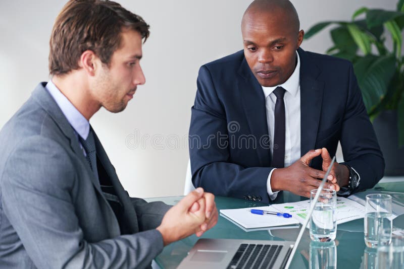 Reporting To Management. Two Businessmen Discussing Work while Sitting ...