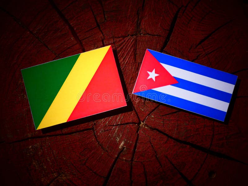 Republic of the Congo Flag with Cuban Flag on a Tree Stump Isolated ...