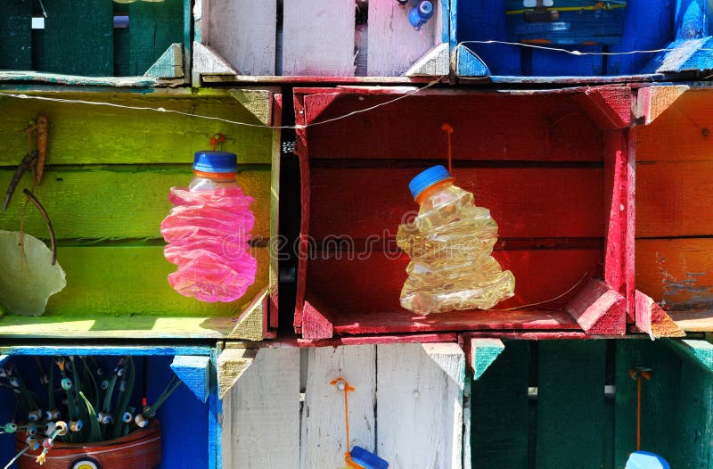Repurposed Plastic Bottles in Painted Boxes Stock Image - Image of ...