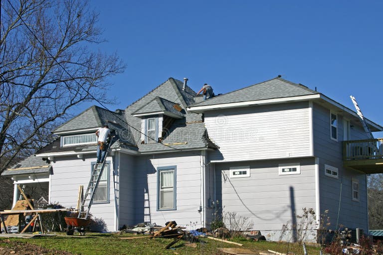 Reroofing the house stock photo. Image of toil, construction - 23191170