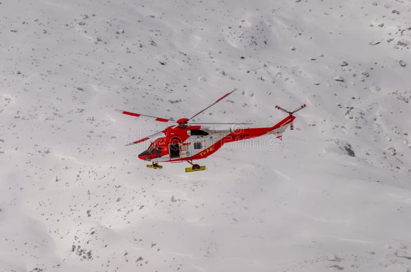 Rescue Helicopter in Action in Tatra Mountains Stock Image - Image of ...