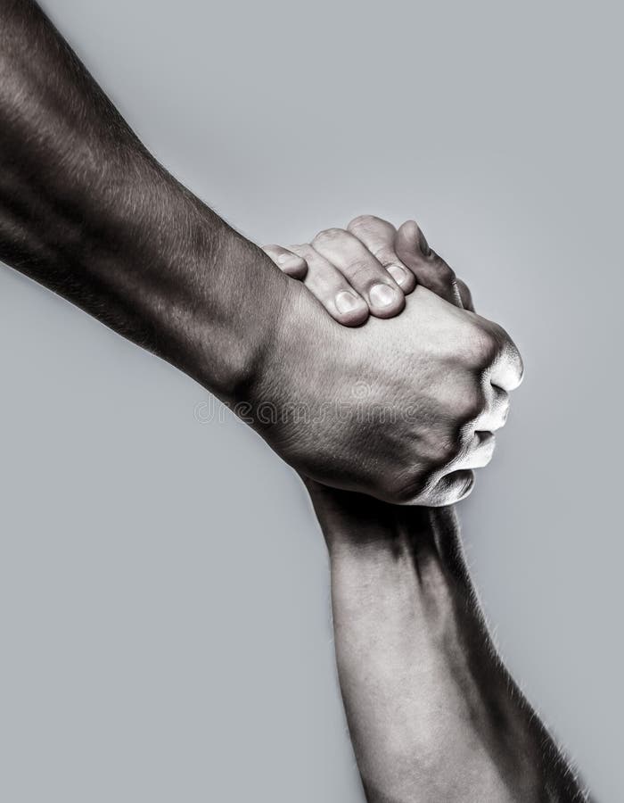Rescue, Helping Hand. Two Hands, Helping Hand of a Friend. Black and ... Rescue, Helping Hand. Two Hands, Helping Hand of a Friend. Black and ...