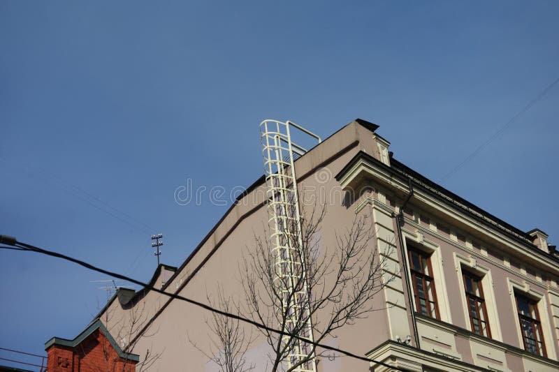 Rescue Ladder Mounted on the Wall Stock Image - Image of metal, safety ...