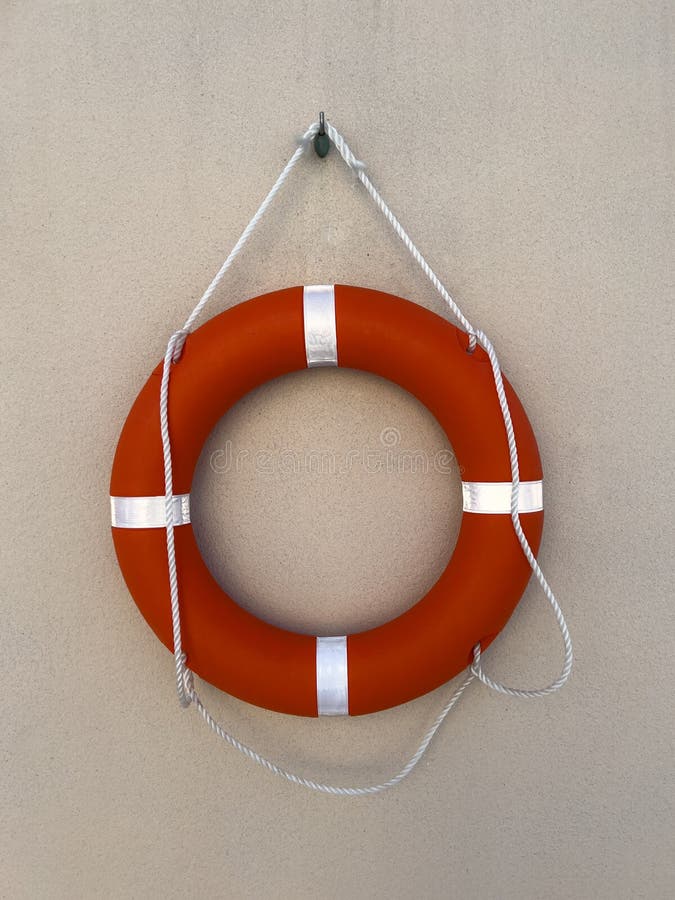 Rescue Ring Mounted on a Concrete Wall Stock Photo - Image of ...