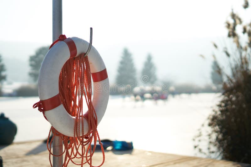 Rescue Ring with Rope in Front of a Lake, Winter, Snow Stock Image ...