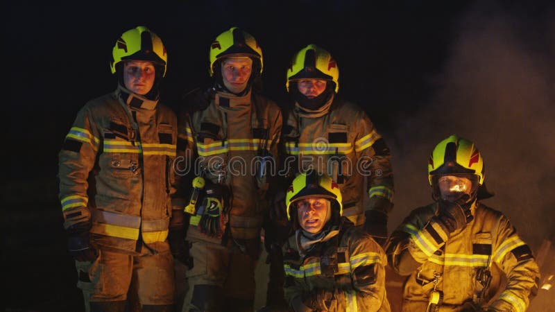 Two Firefighters Shaking Hands after Successful Fire Drill Stock Photo ...