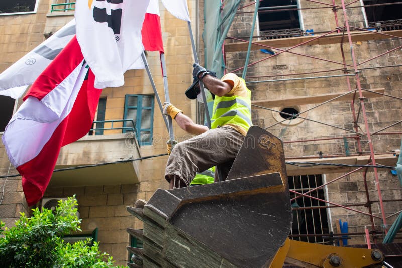 Rescue Workers on a Wheel Loader Posing for a Group Photo Editorial ...