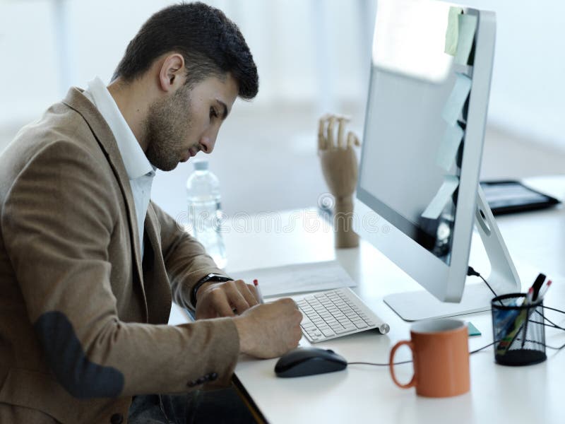 Research, Computer and Writing with Businessman in Office for Web ... Research, Computer and Writing with Businessman in Office for Web ...