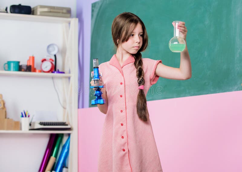 Research and Development. Girl Study Chemistry with Testing Tube ...