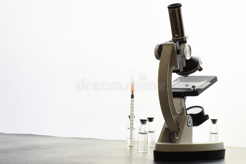Research Laboratory. Test Tubes and Microscope on the Table on a White ...