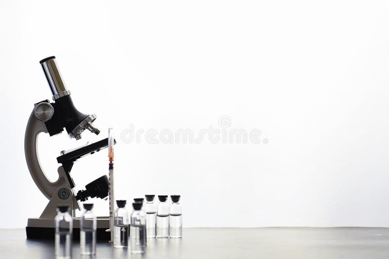 Research Laboratory. Test Tubes and Microscope on the Table on a White ...