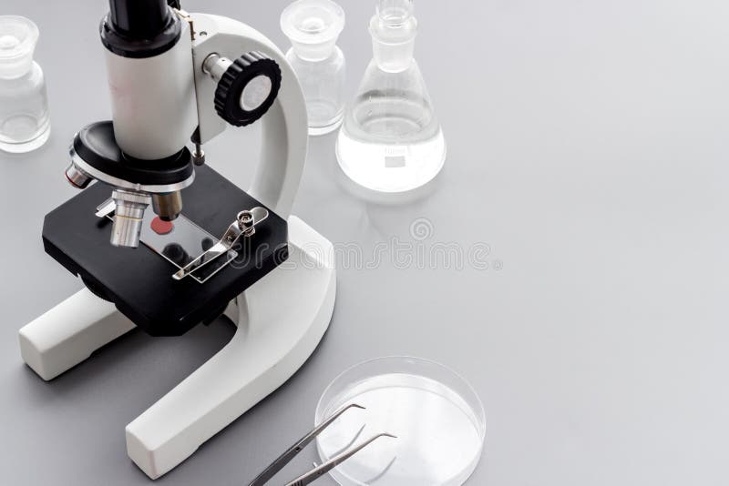 Research with Microscope. Laboratory Backround with Blood Sample on ...