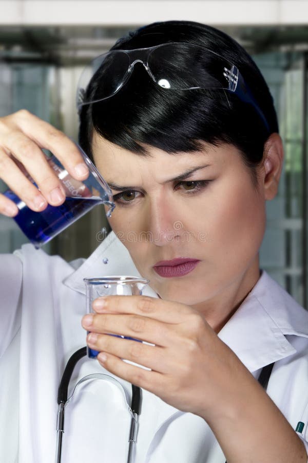 Research Scientist Testing Specimen in Laboratory Stock Photo - Image ...