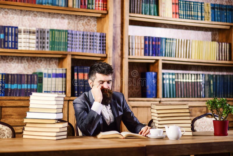 Research and Study Concept. Professor in Library Makes Historical ...