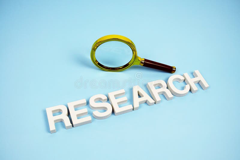 Research Word with Magnifying Glass Top View on Blue Background Stock ...