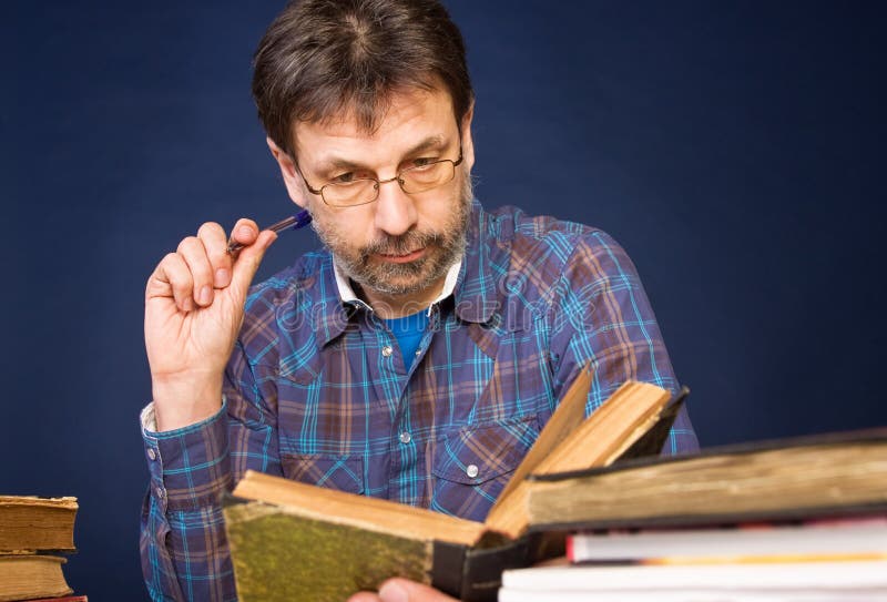 Researcher with the books stock photo. Image of journalist - 4849368