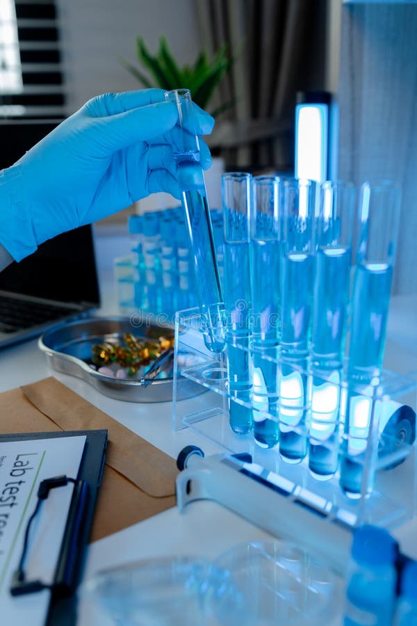 A Researcher is Conducting Scientific Experiments on a Liquid Substance ...