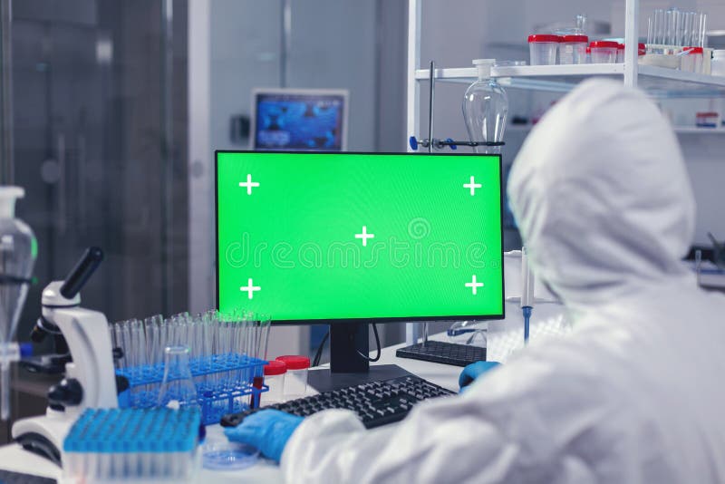 Researcher Developing Cure for Covid19 Using Pc with Green Screen Stock ...