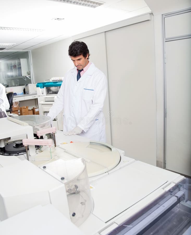 Scientist Observing Experiment Stock Photo - Image of examination ...