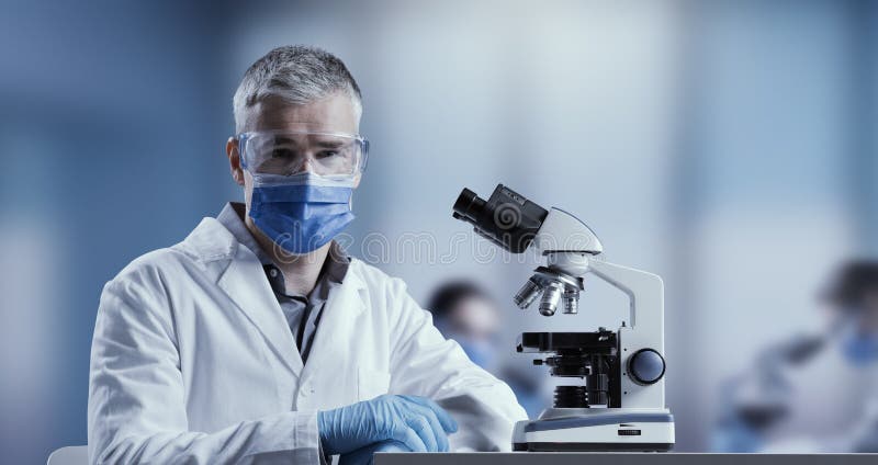 Researcher with Face Mask Working in the Laboratory Stock Image - Image ...