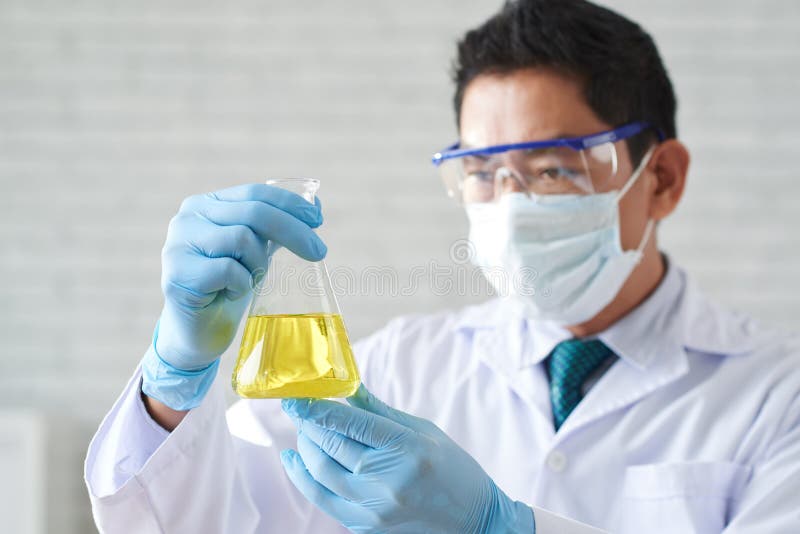 Beaker with Yellow Liquid on White Stock Photo - Image of analytic ...