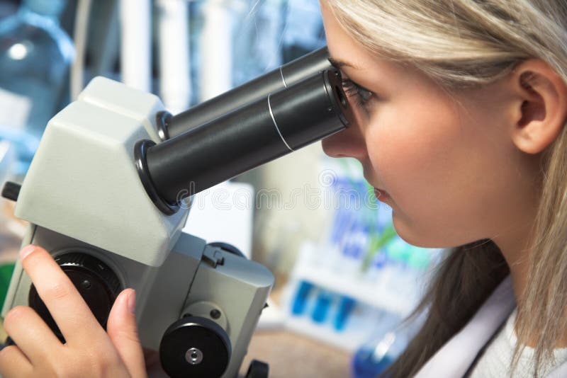 Researcher with microscope stock photo. Image of biology - 26192294