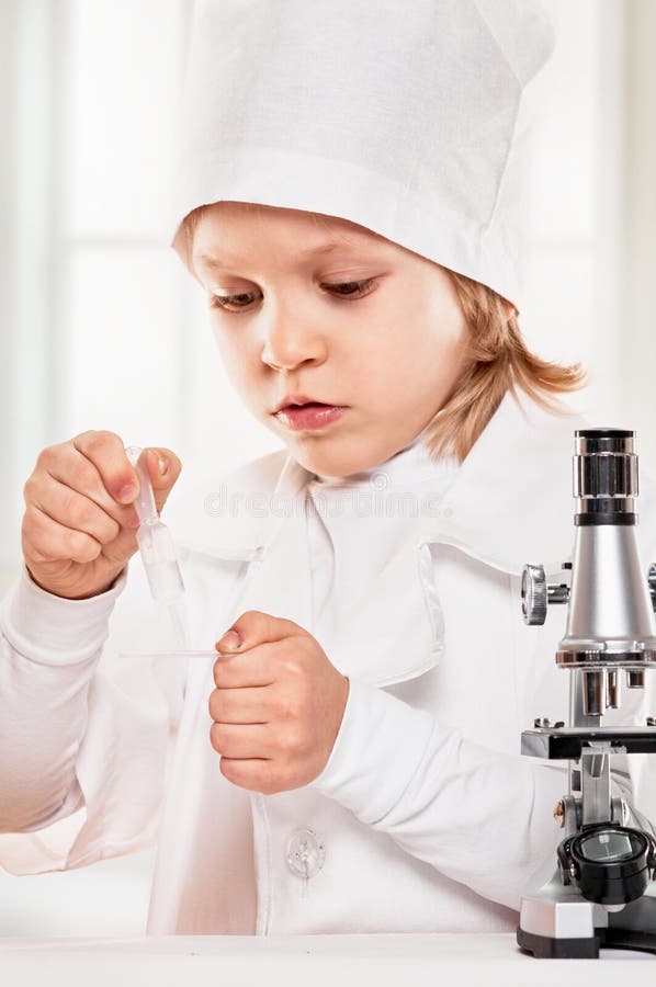 Researcher with microscope stock photo. Image of biology - 26192294