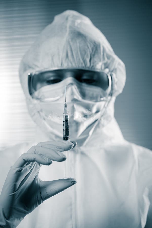 Researcher in Protective Suit Preparing a Syringe Stock Photo - Image ...