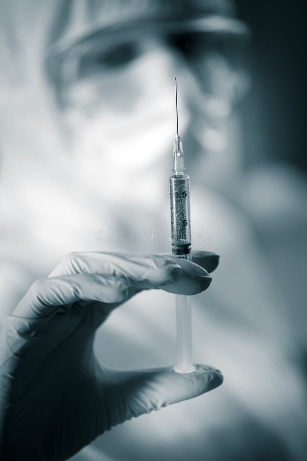 Researcher in Protective Suit Preparing a Syringe Stock Photo - Image ...