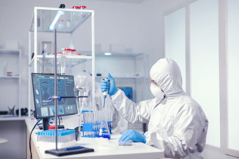Researcher Testing Liquid Sample Uses Micropipette Stock Photo - Image ...