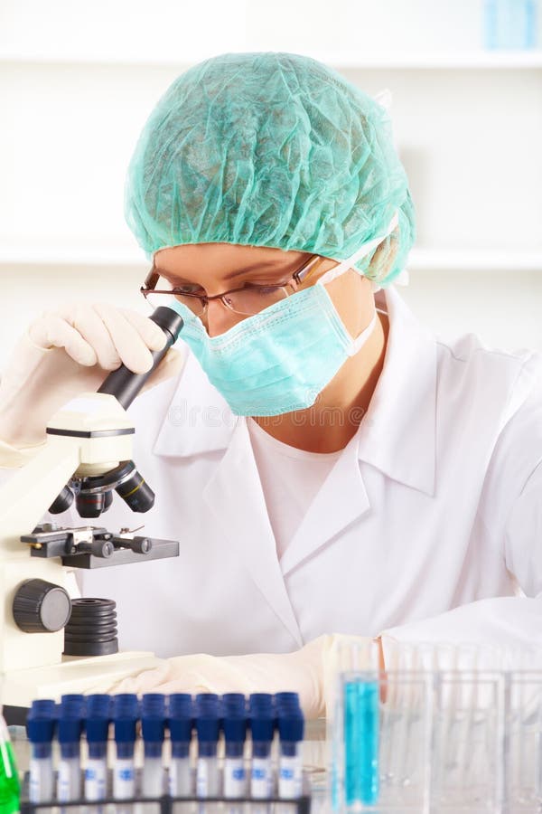 Researcher Using a Microscope in a Laboratory Stock Image - Image of ...