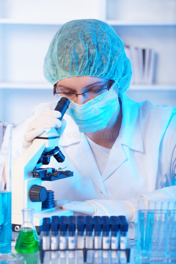 Researcher Using a Microscope in a Laboratory Stock Image - Image of ...
