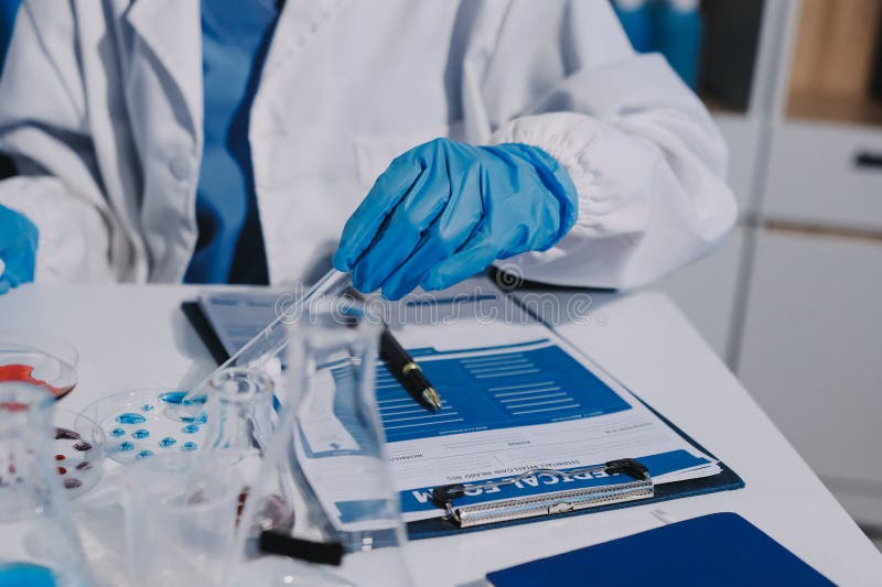 Researcher Using a Professional Microscope Stock Photo - Image of blue ...