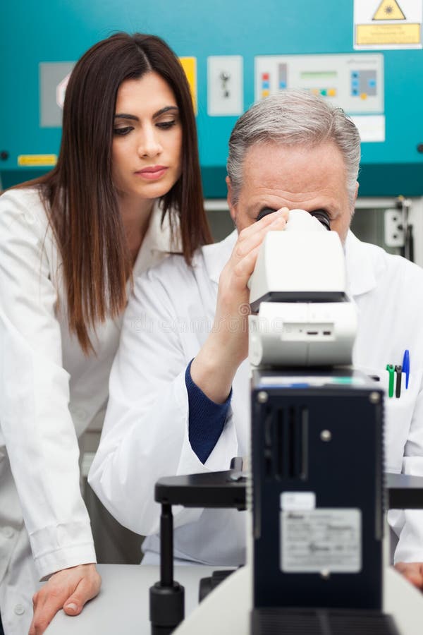 Researcher at work stock image. Image of analytical, microscope - 41801567