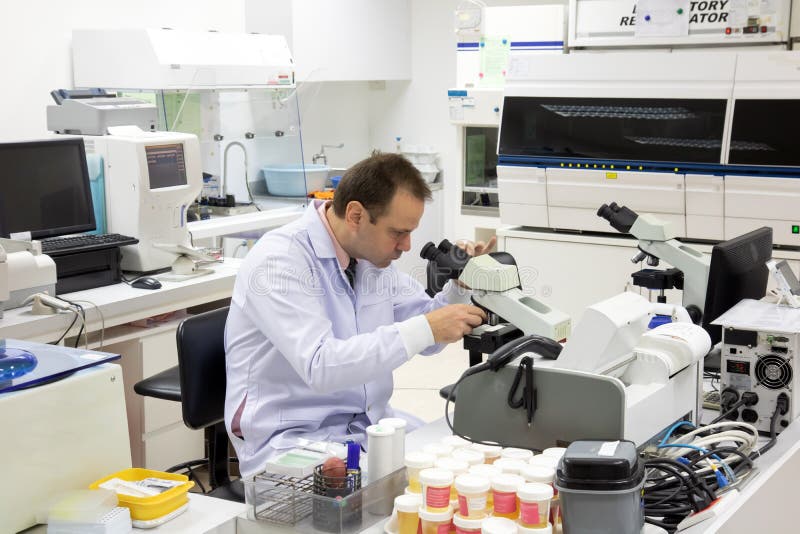 Work with a Microscope. Under the Microscope Stock Photo - Image of ...