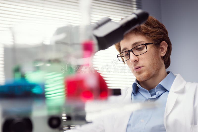 Researcher at work stock image. Image of microscope, healthcare - 47539523