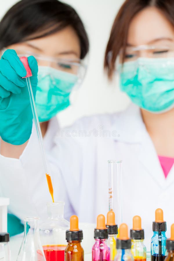 Researcher Working with Chemicals Stock Photo - Image of bottle ...