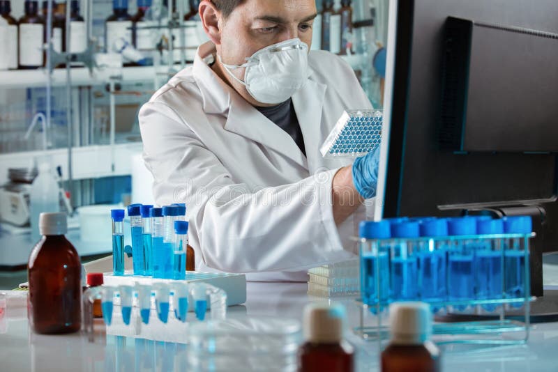 Researcher Working with Data Analysis Report in Digital Tablet O Stock ...