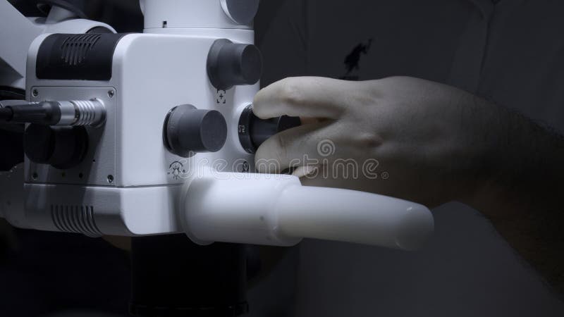 Researcher Working with a Microscope, Close Up. Action. Scientific ...