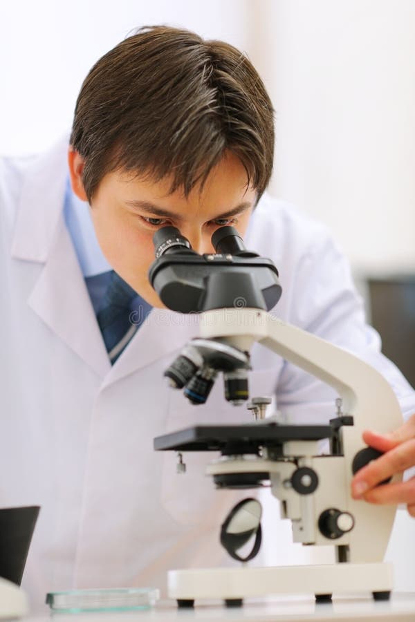 Researcher Working with Microscope in Laboratory Stock Image - Image of ...