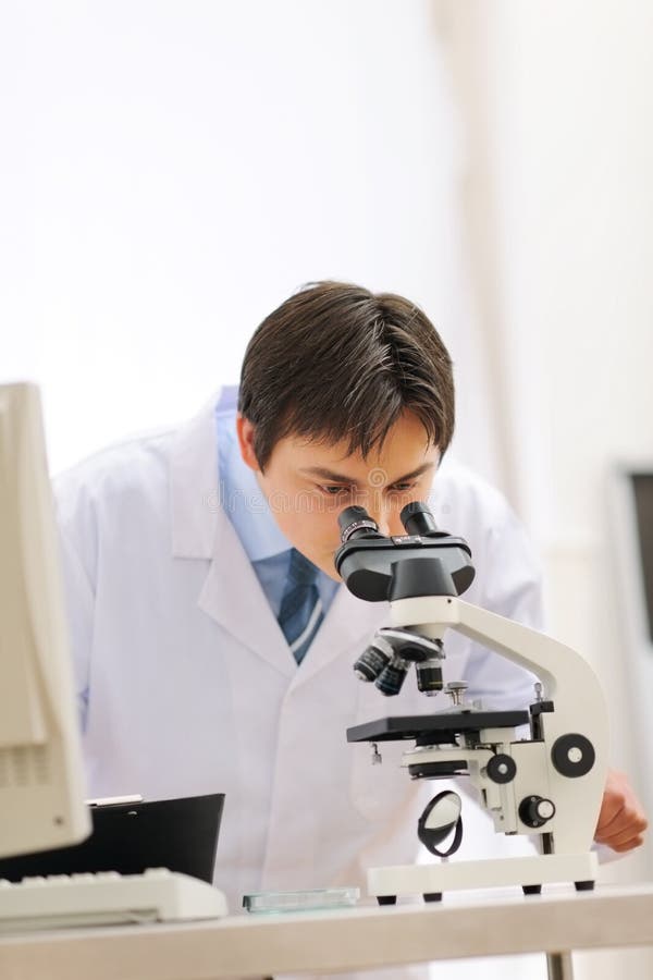 Researcher Working with Microscope in Laboratory Stock Image - Image of ...