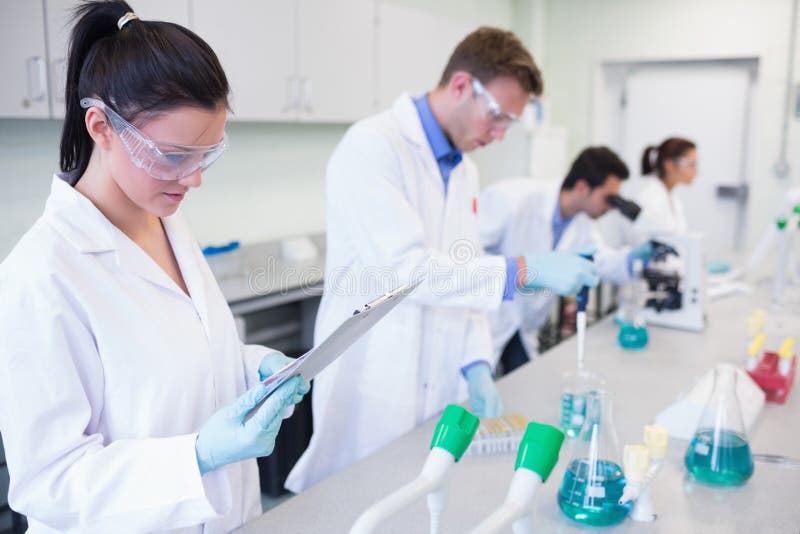 Researchers Carrying Out Experiments in the Lab Stock Image - Image of ...