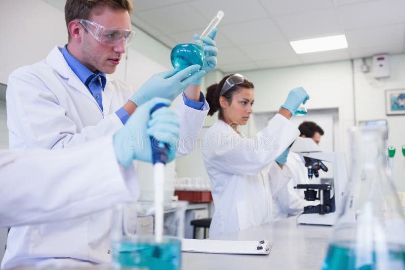 Researchers Carrying Out Experiments in the Lab Stock Image - Image of ...