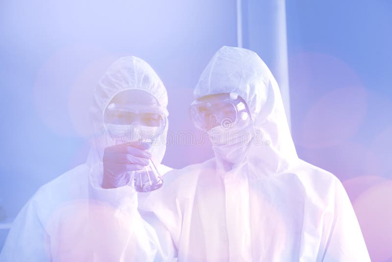 The Researchers Working with New Product in Lab Glass Stock Photo ...