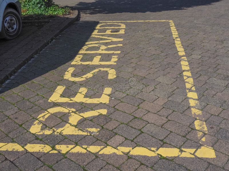 Reserved parking sign stock image. Image of stone, painted - 162675679