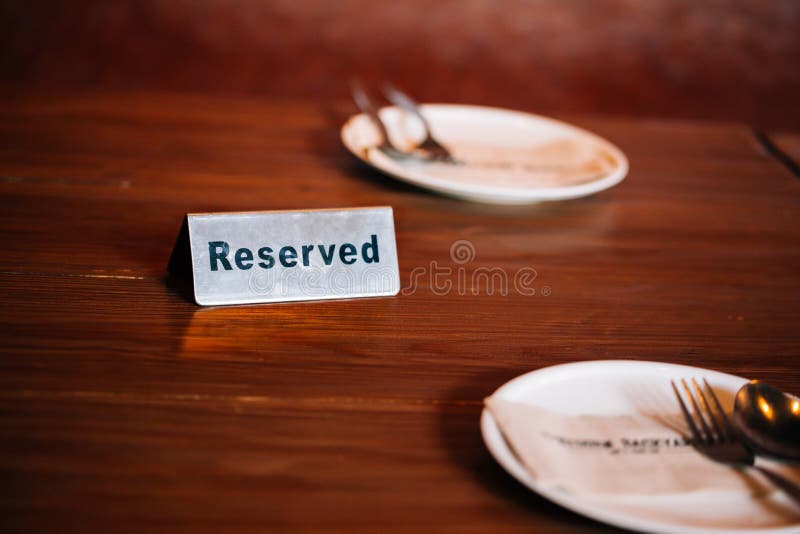`Reserved` Sign on Dining Table in Restaurant with Spoon, Fork a Stock ...