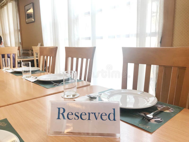 Reserved Sign on Restaurant Table Stock Image - Image of meal, cafe ...