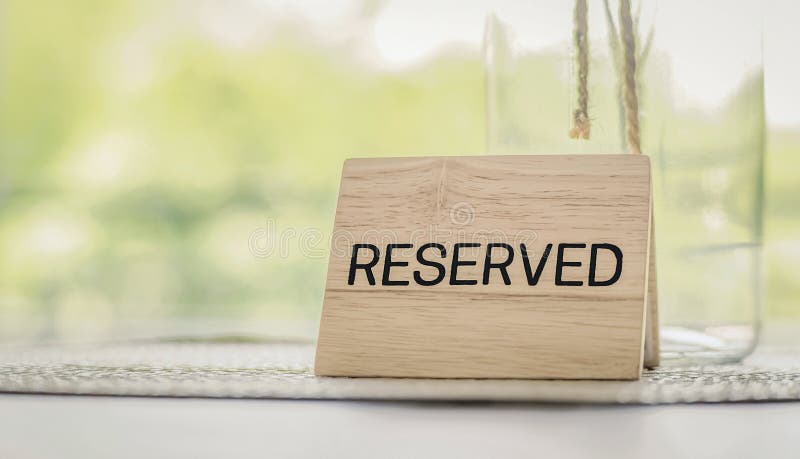 Reserved sign on the table stock photo. Image of lunch - 291293456