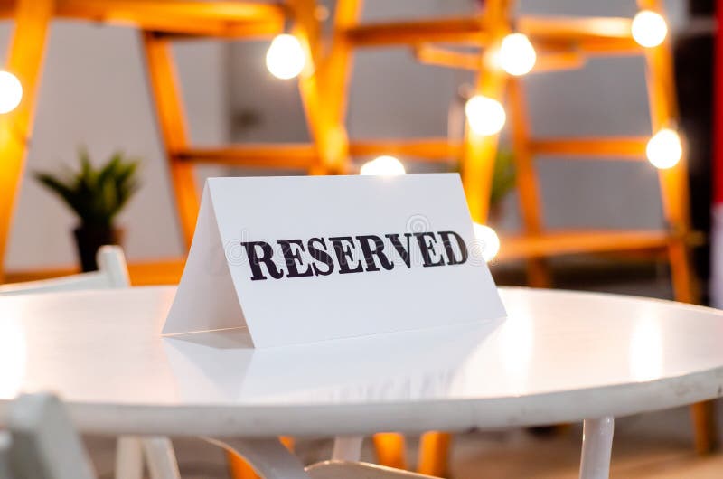 Reserved Sign on a Table in Restaurant Stock Photo - Image of cafe ...